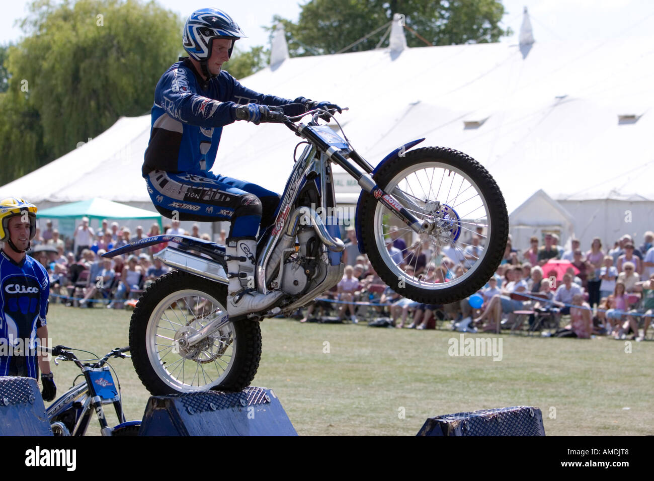 Motorbike stunt team riders putting on a display Stock Photo - Alamy