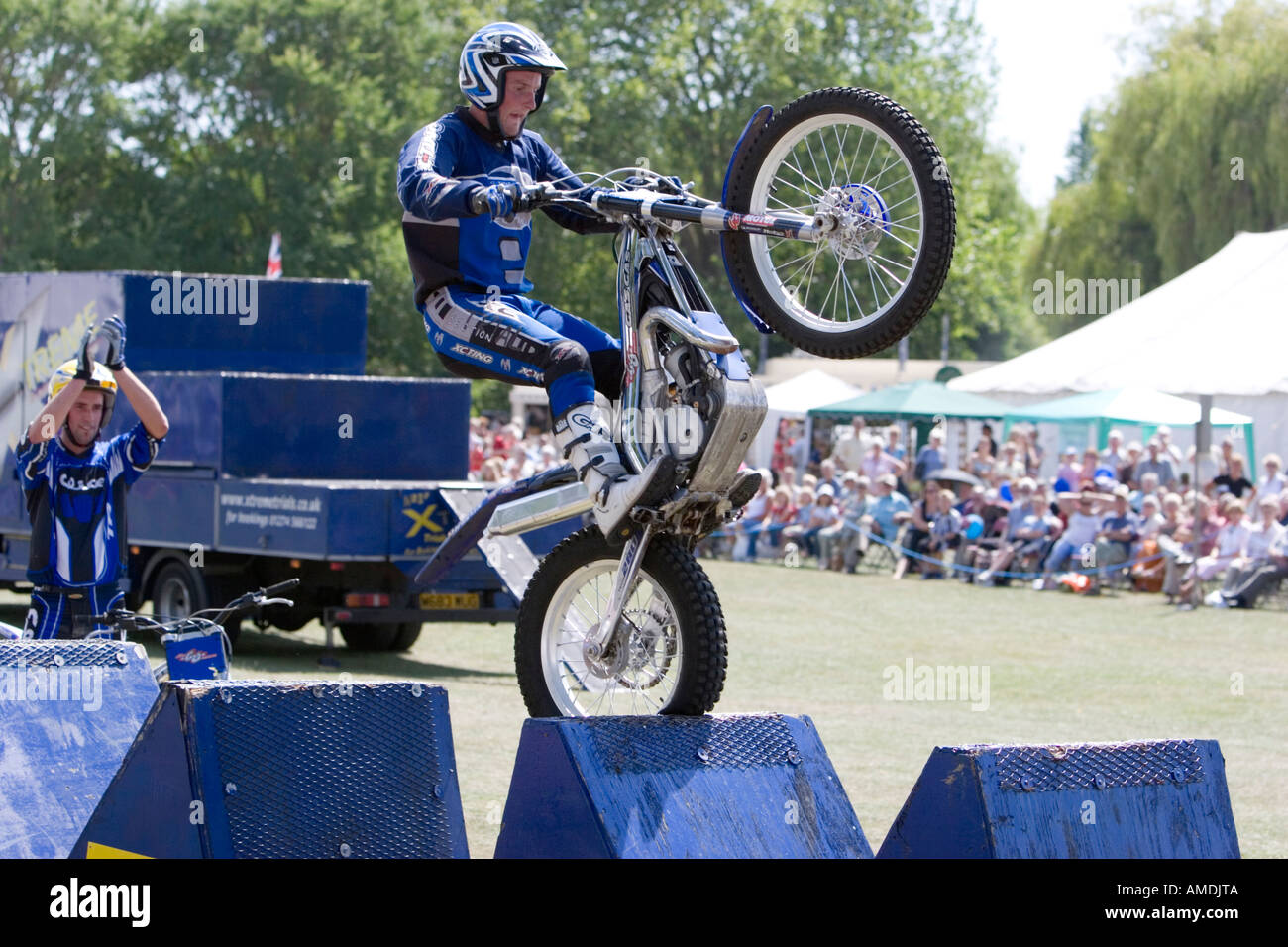Motorbike stunt team riders putting on a display Stock Photo - Alamy
