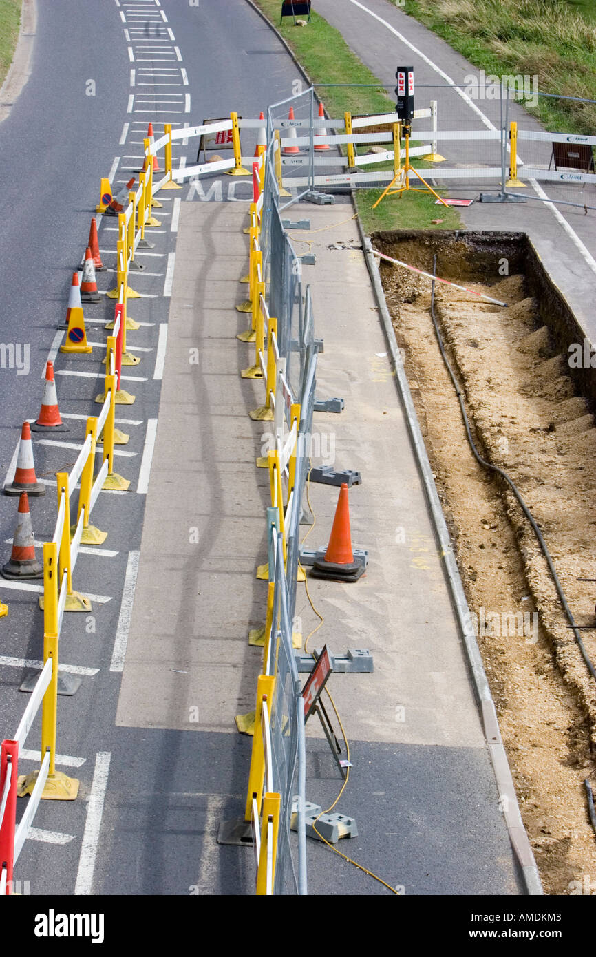 Roadworks and traffic control Stock Photo - Alamy