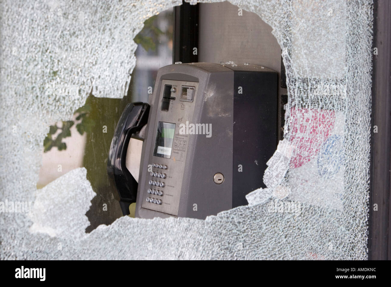 Smashed and vandalised telephone box Stock Photo - Alamy