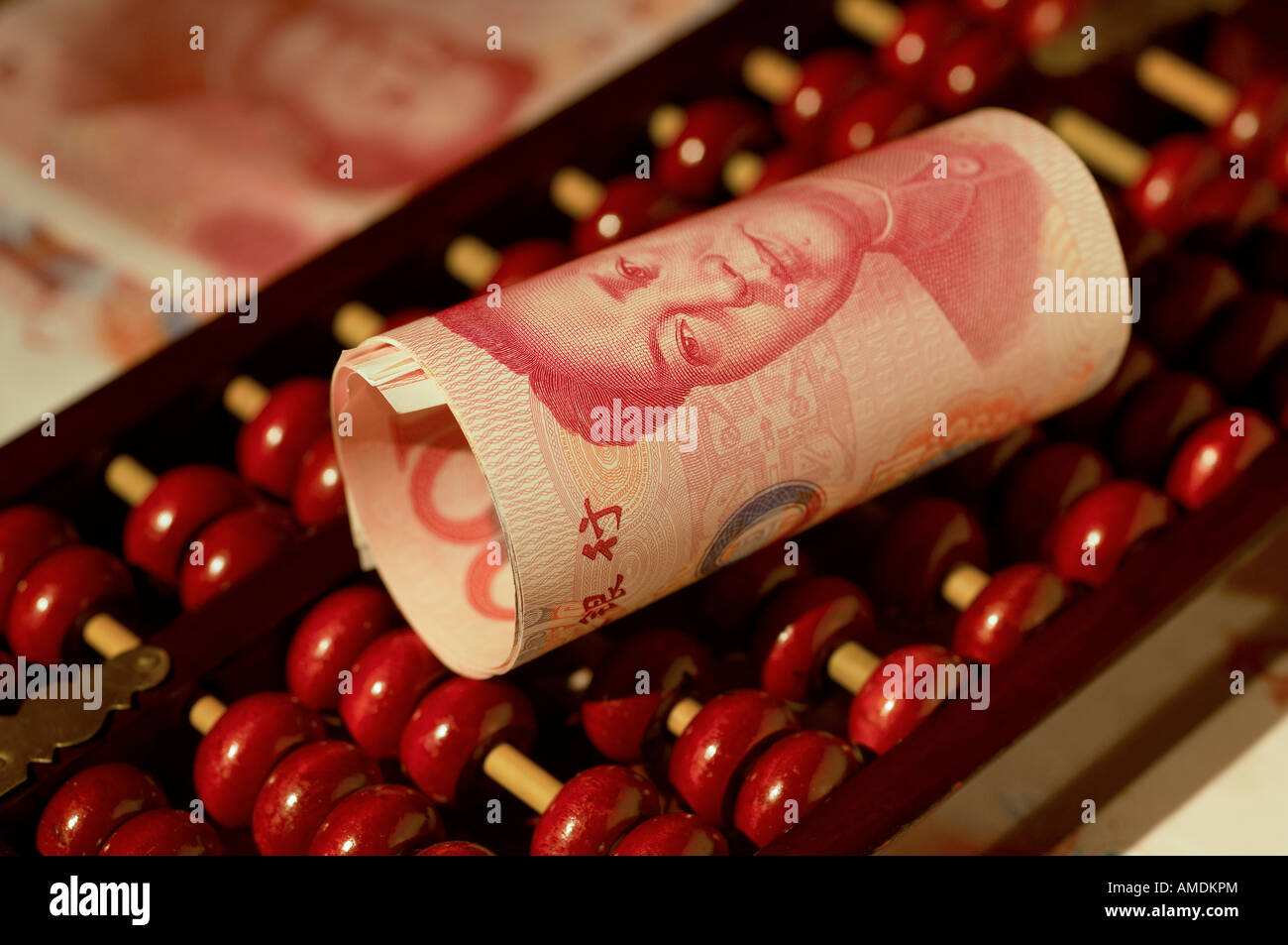 Chinese currency notes on abacus Stock Photo - Alamy