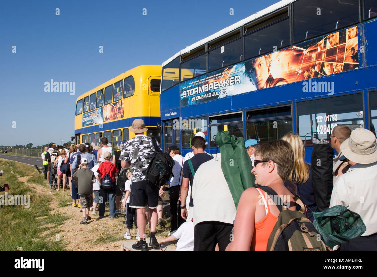 Queue of passengers boarding a double decker bus Stock Photo - Alamy