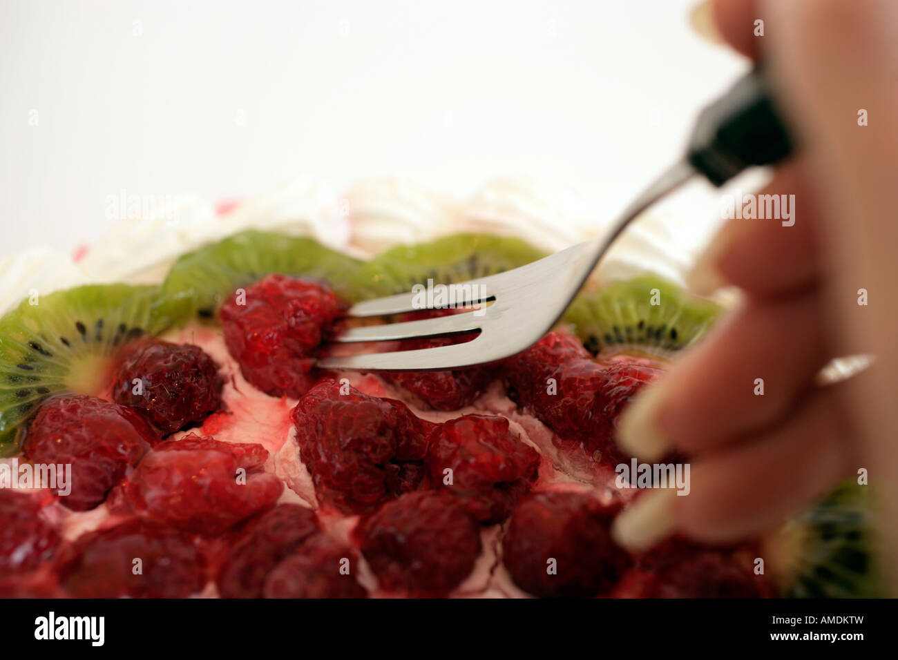 Tucking into cake Stock Photo - Alamy