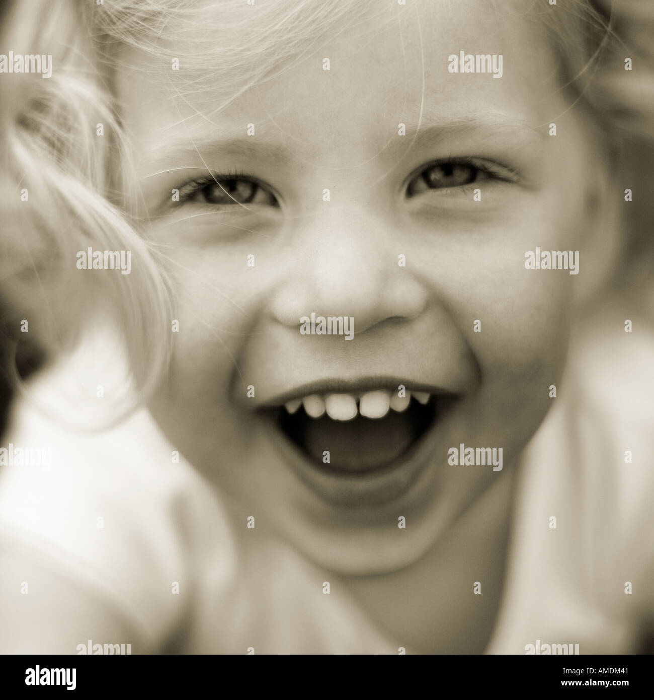 young girls face with strong expression in sepia tone Stock Photo - Alamy