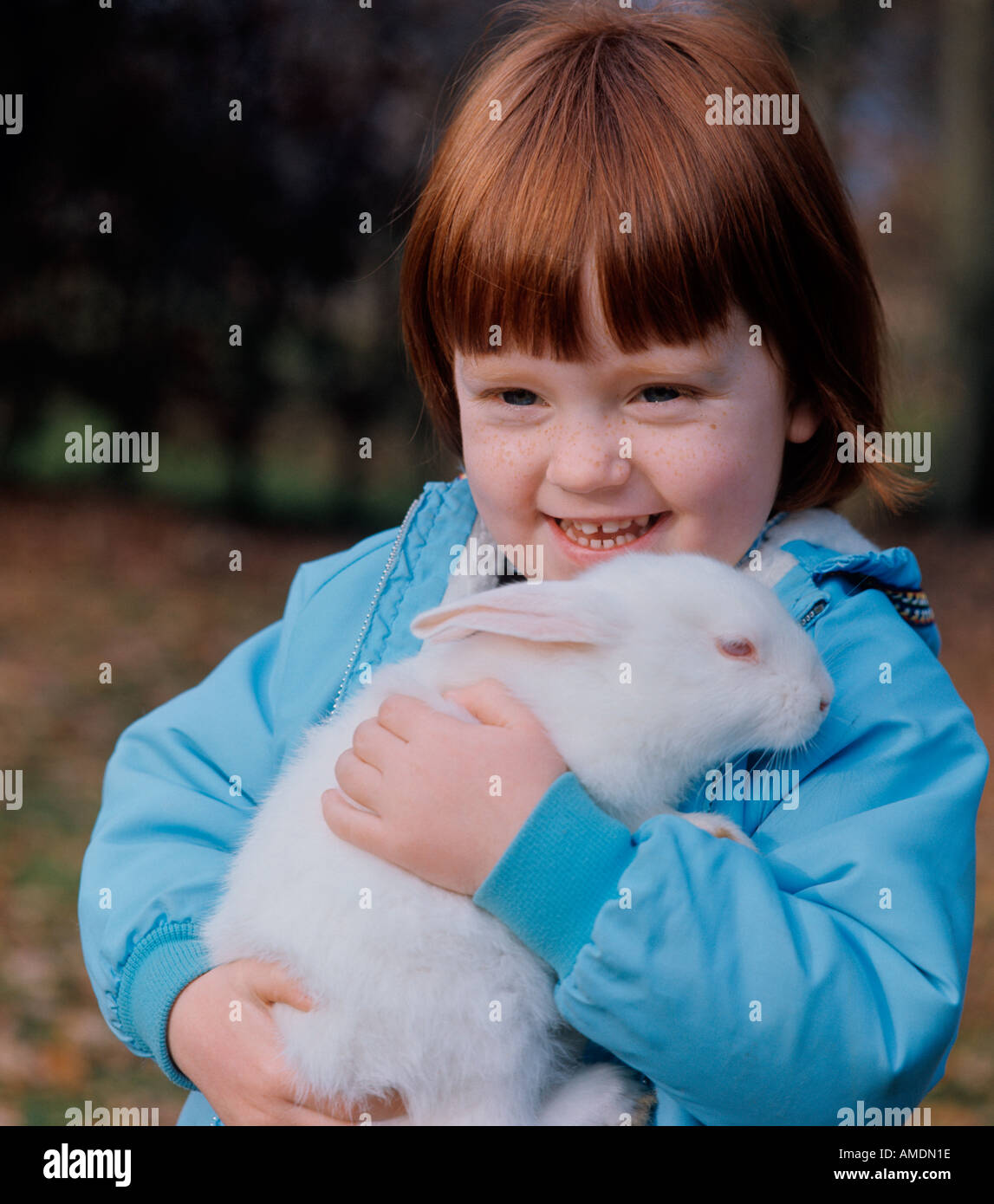 Child With Pet white Rabbit Stock Photo - Alamy