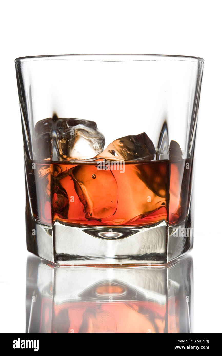 cut out of a single glass of bourbon whisky with ice on the rocks Stock ...