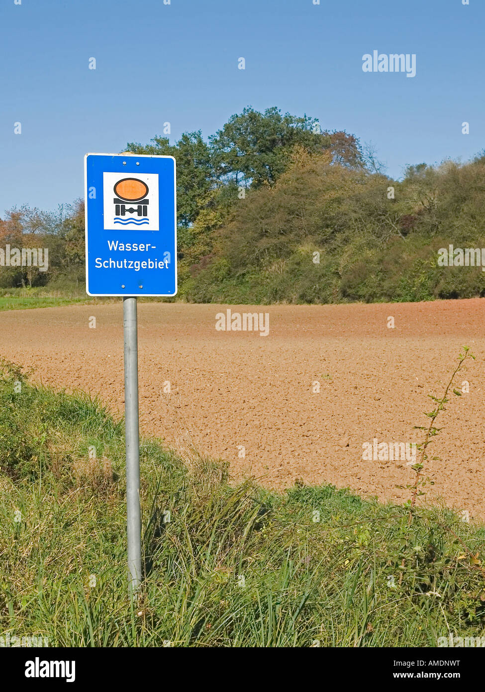 traffic sign for water protection area in nature in front of an empty ...