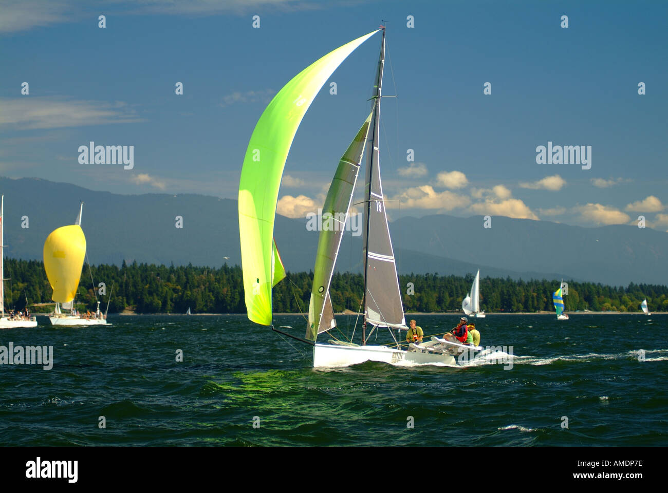 Martin 243 yacht sailing with spinnaker Vancouver Stock Photo - Alamy