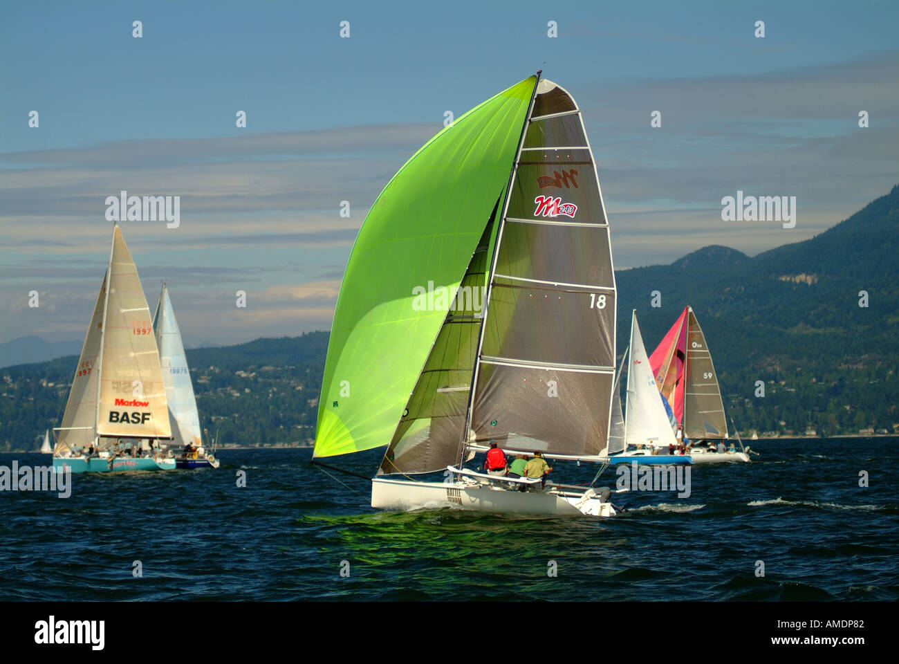 Martin 243 yacht sailing with spinnaker Vancouver Stock Photo - Alamy
