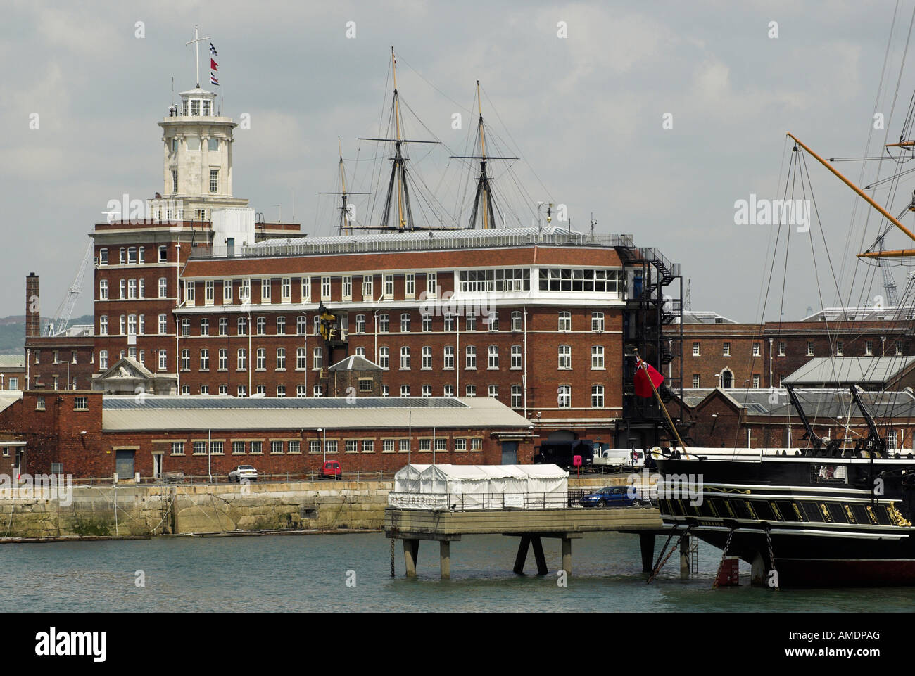 Royal Navy Buildings at Portsmouth Historic Dockyard (the stern of HMS ...