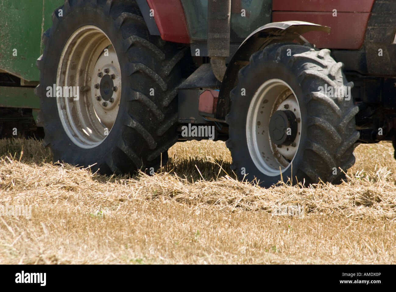 Tractor wheels Working Field Harvesting Stock Photo - Alamy