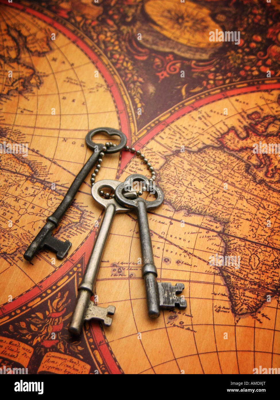 Three Skeleton Keys on World Map Stock Photo - Alamy