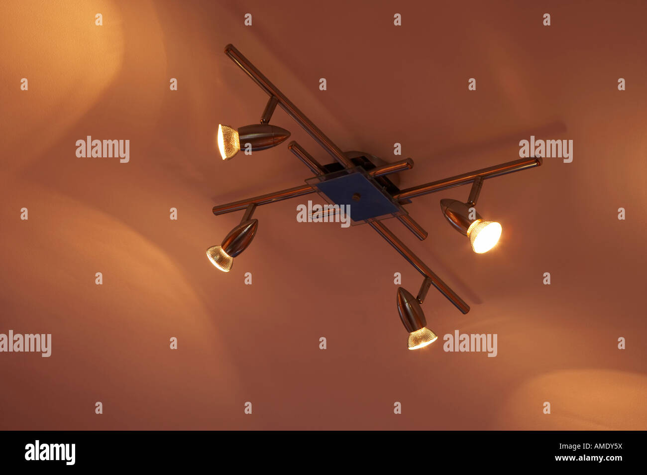 MODERN STAINLESS STEEL LIGHT FITTING WITH FOUR TUNGSTEN BULBS Stock ...