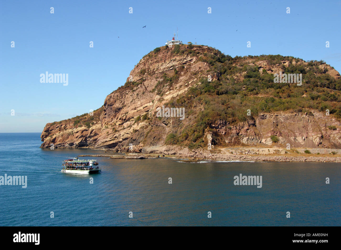 North America, Mexico, State of Sinaloa, Mazatlan. Tourist boat off the ...