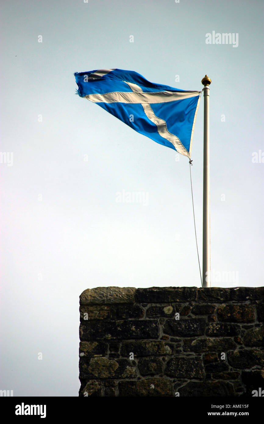 Scottish Saltire flag flying over castle tower Stock Photo - Alamy