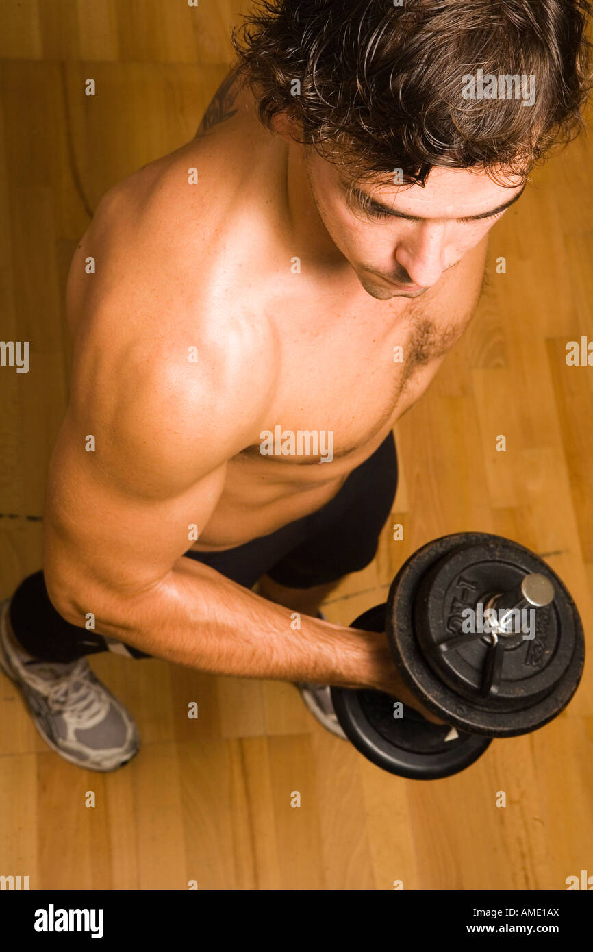 muscular man working out Stock Photo - Alamy