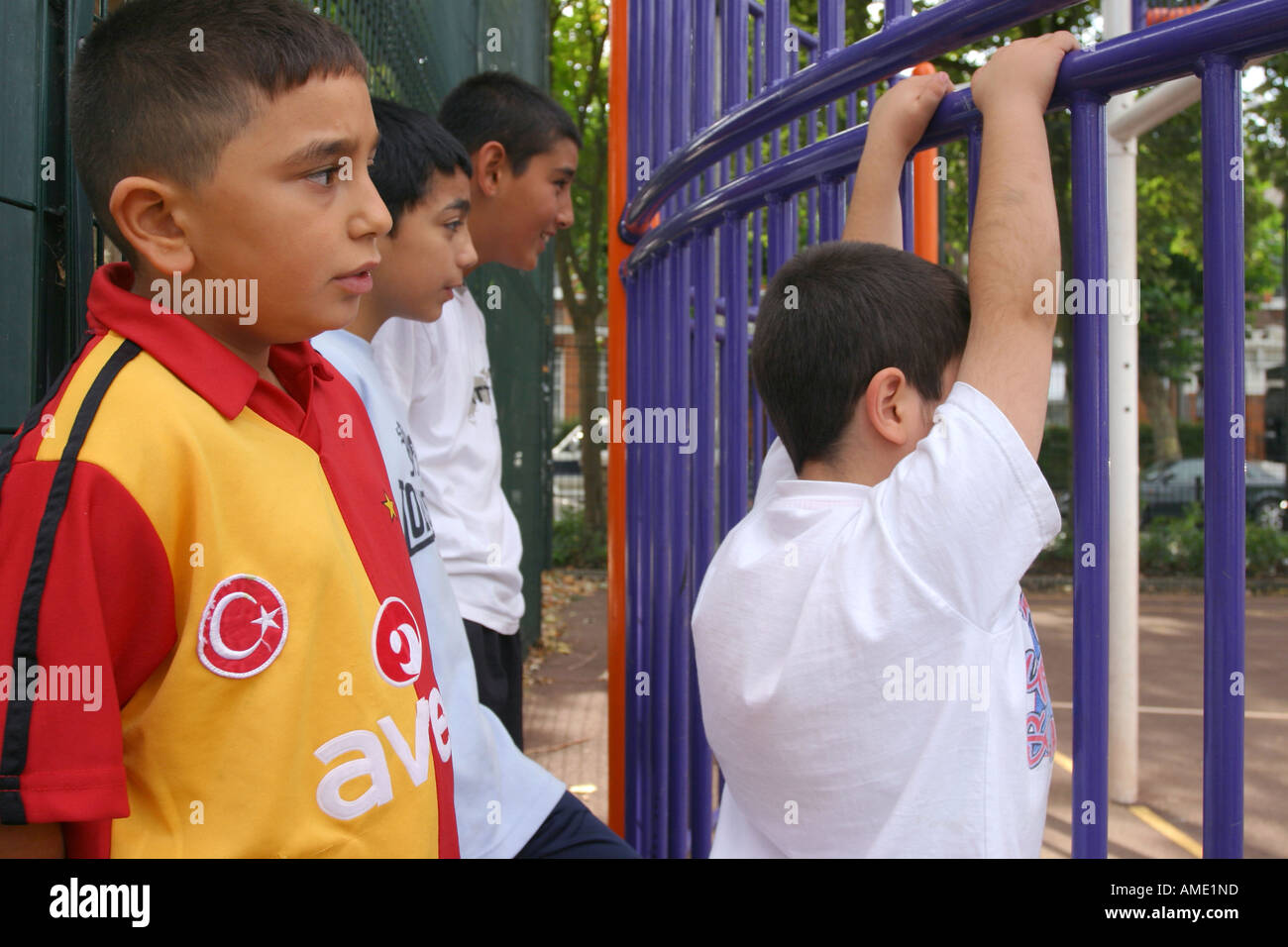 Turkish children playing in the playground of a housing estate ...