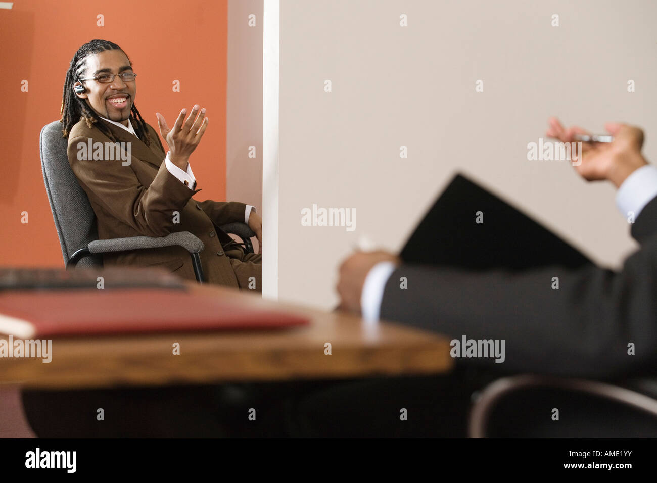 Two person talking inside hi-res stock photography and images - Alamy