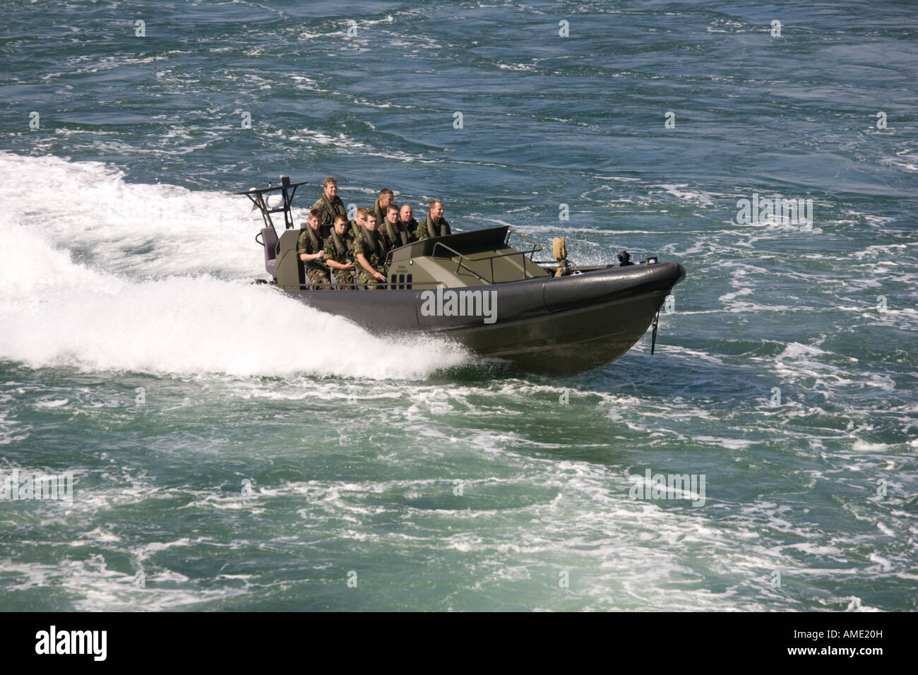 Army recruits in high speed inflatable training craft Poole Harbour ...