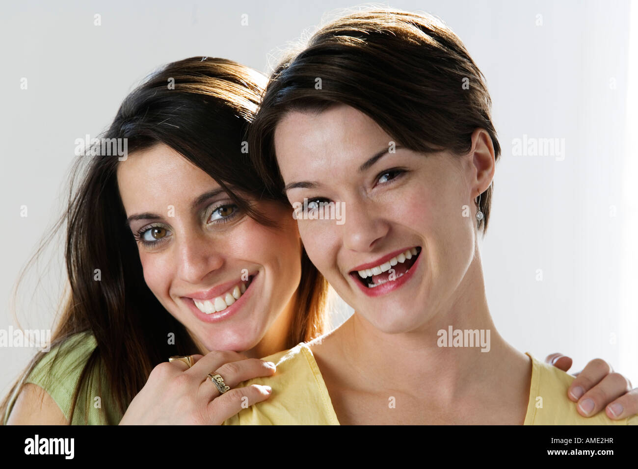 Portrait of two friends smiling Stock Photo - Alamy