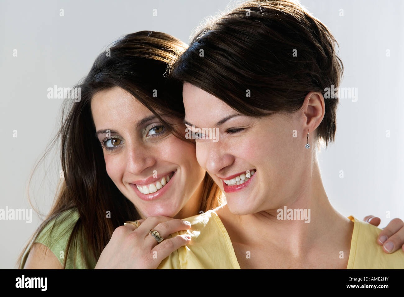 Portrait of two friends smiling Stock Photo - Alamy