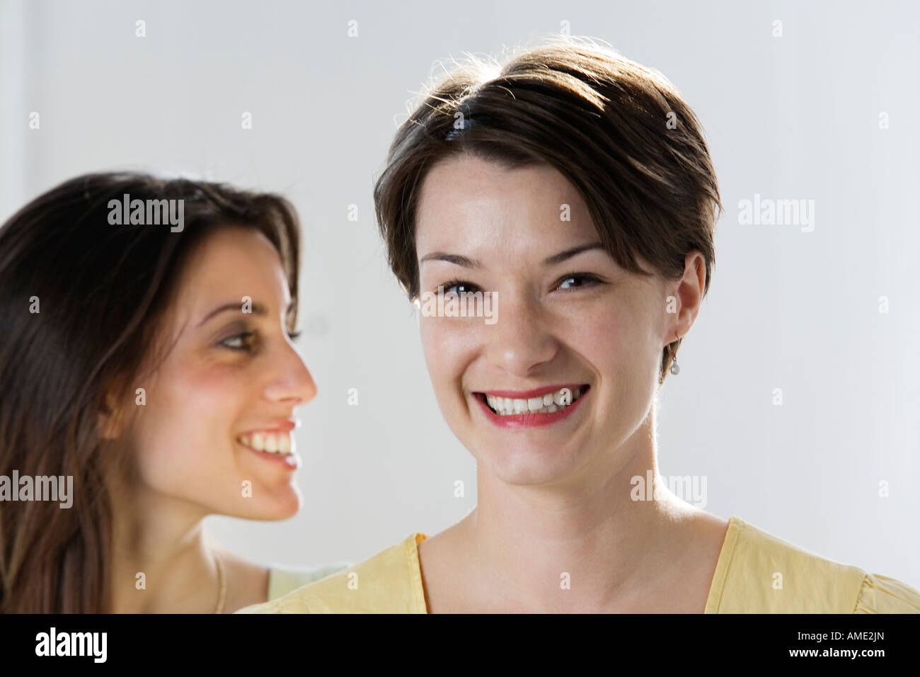 Portrait of women smiling Stock Photo - Alamy