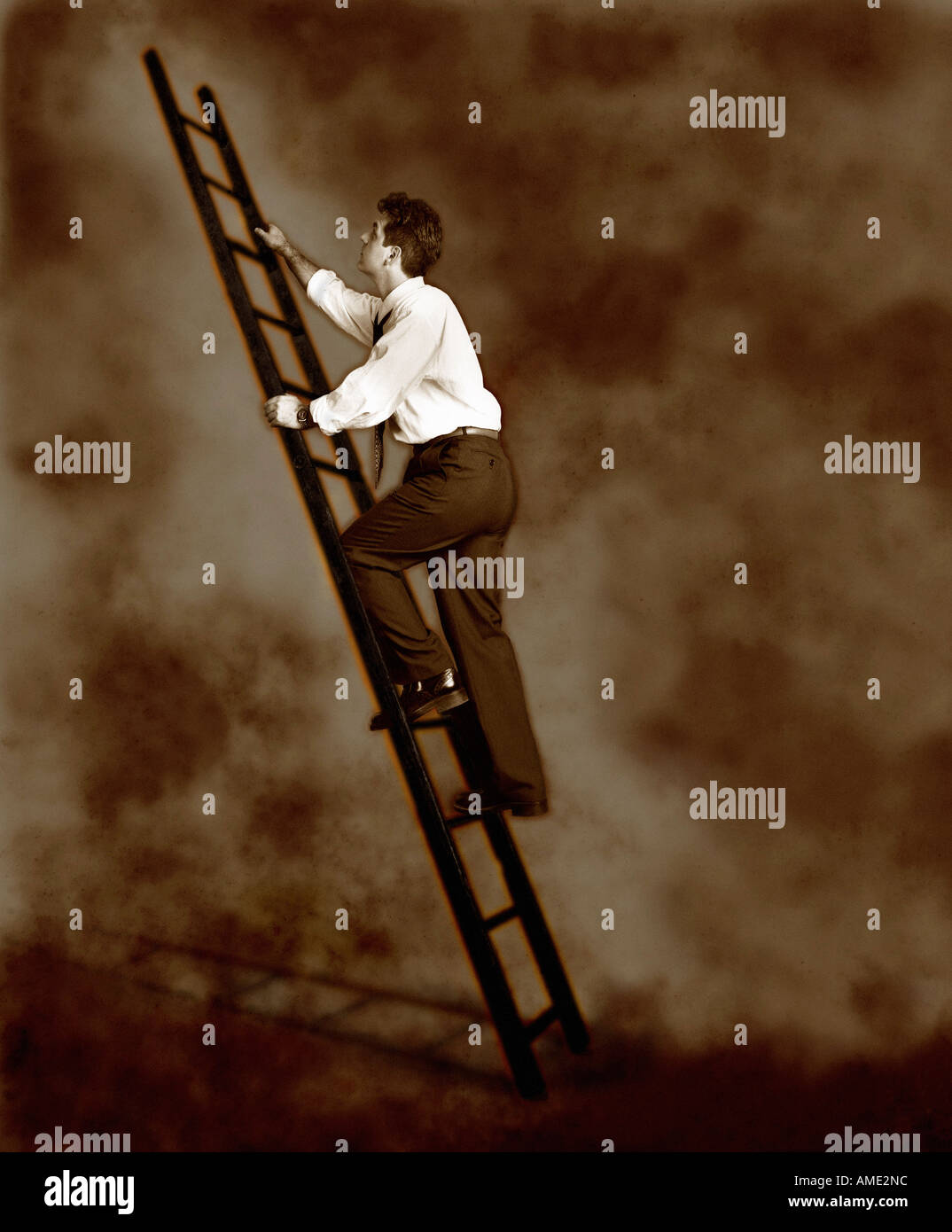 Businessman Climbing Ladder Stock Photo - Alamy