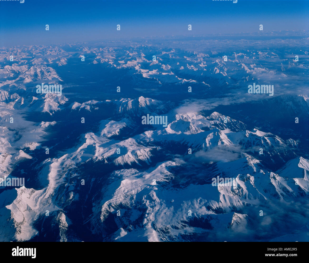 Aerial shot over rocky mountains hi-res stock photography and images ...