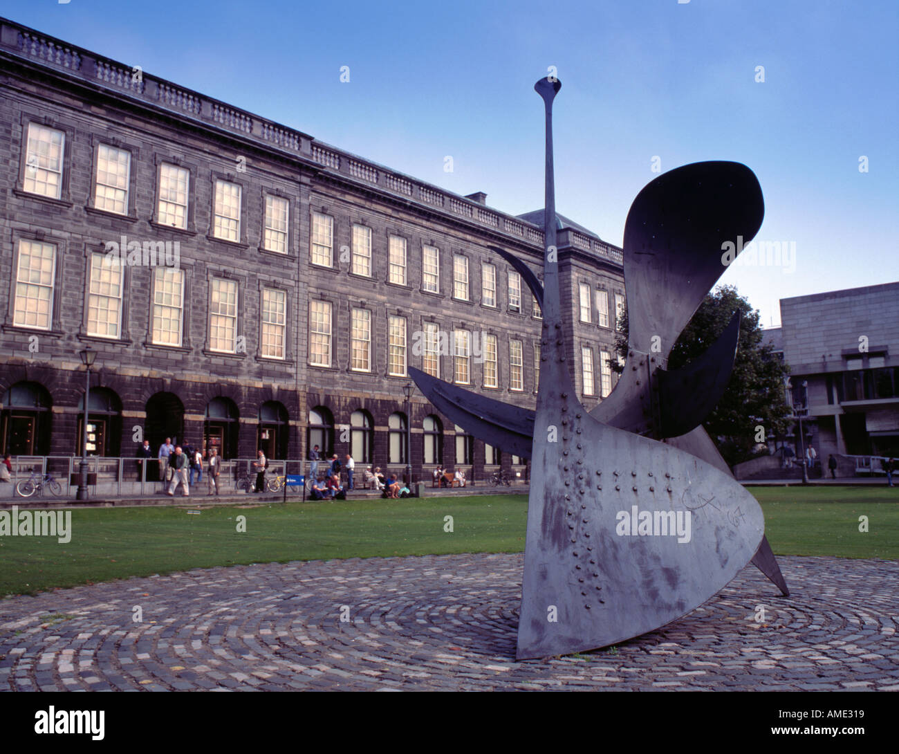 Modern sculpture on Fellow's Square with Old Library Building beyond ...