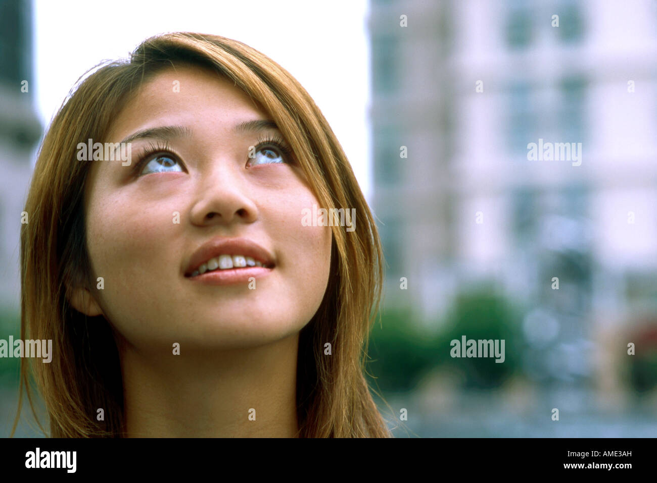 Young Woman Looking Up Stock Photo - Alamy