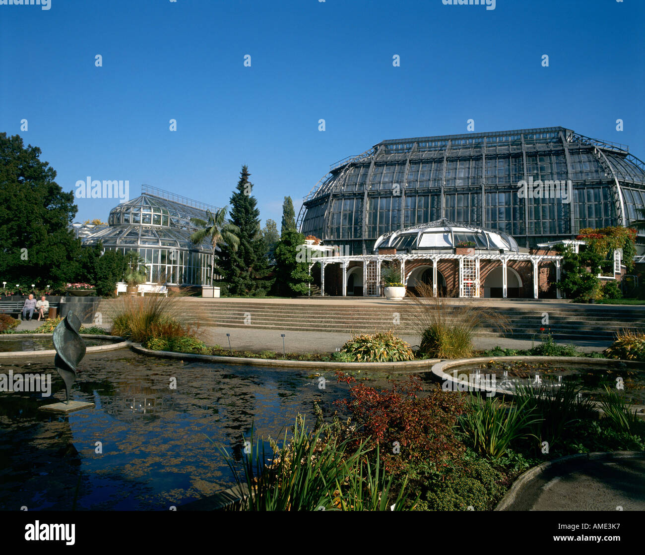 The Tropical House seen beyond a pond in Berlin s Botanical Gardens ...