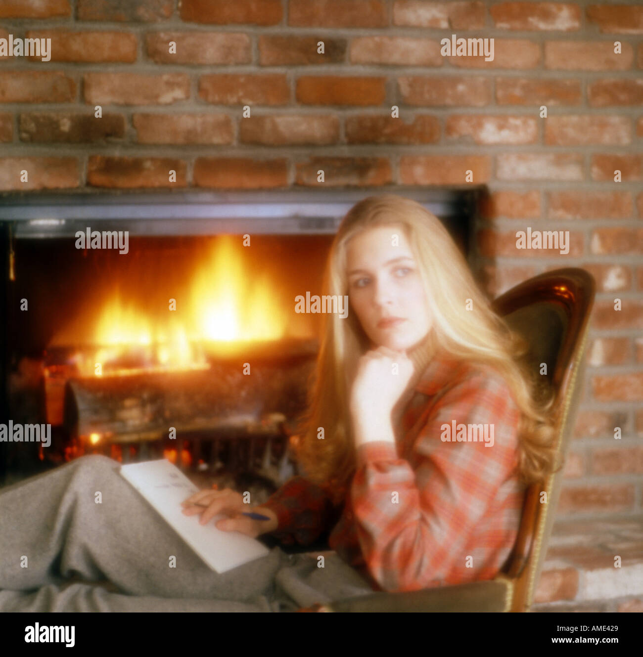 Wistful woman hi-res stock photography and images - Alamy