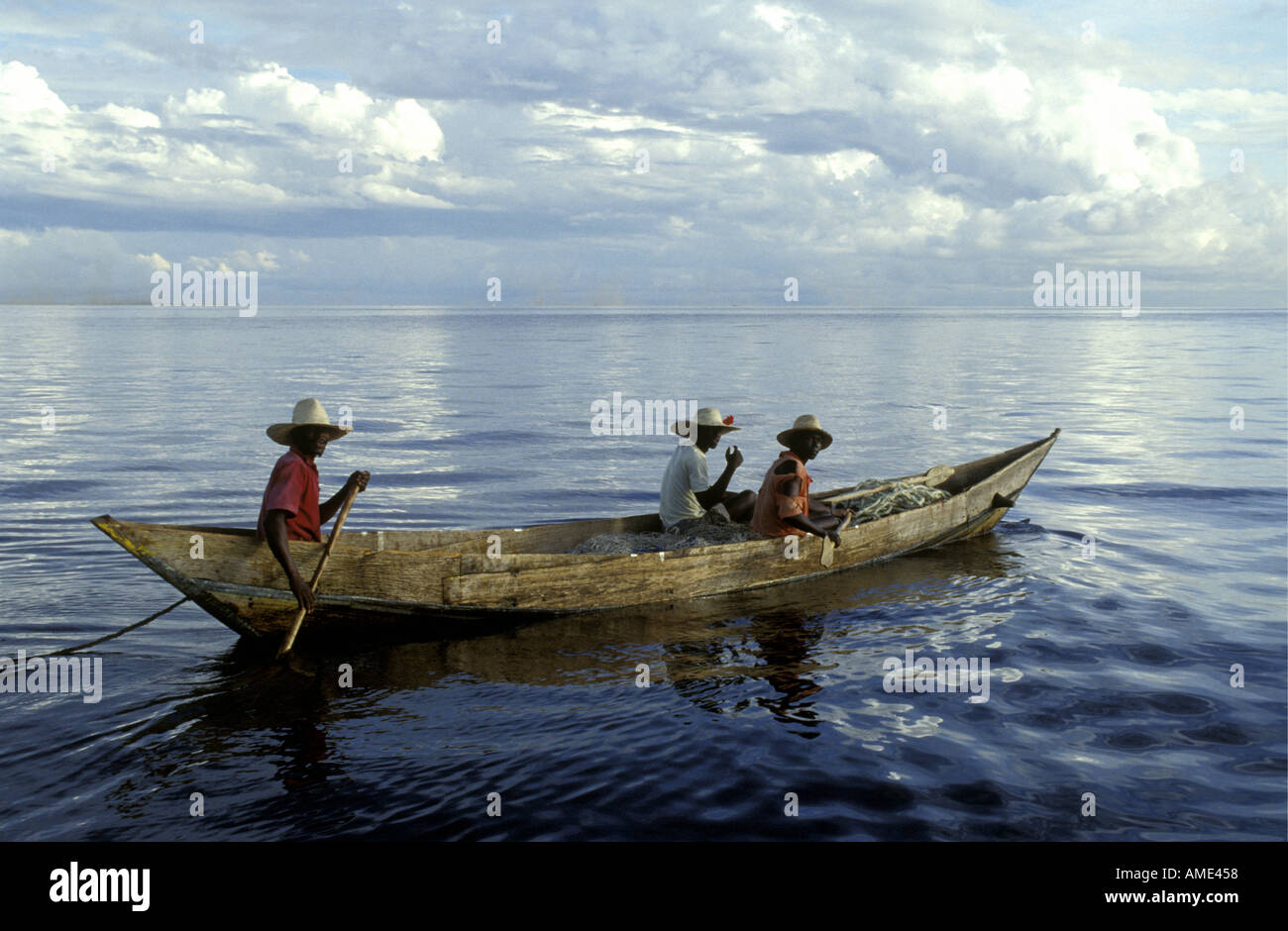 Luo fishermen in their canoe Stock Photo - Alamy