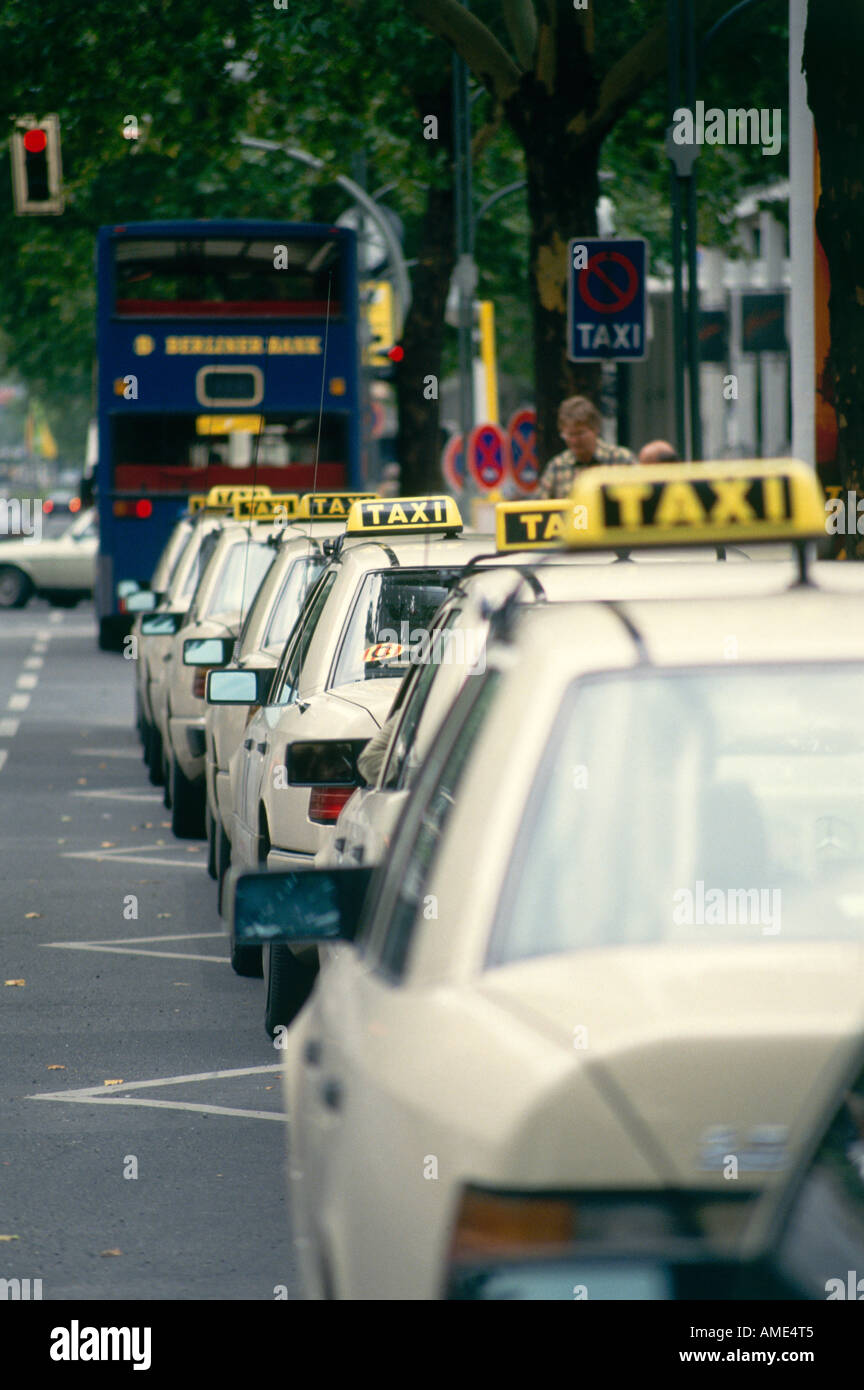 A line of taxis on a street side taxi rank in Berlin Stock Photo - Alamy