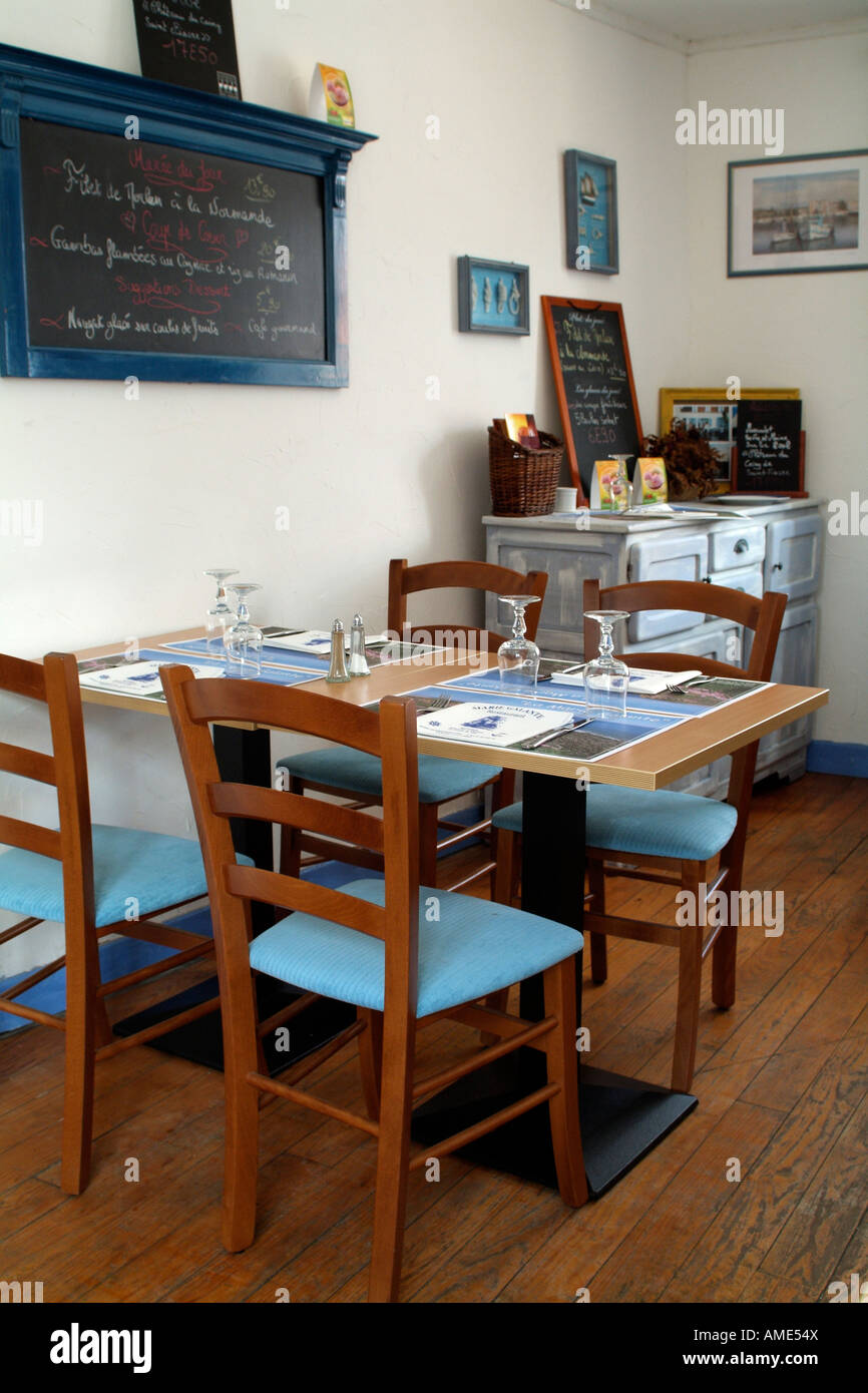 Interior of a French Seafood Restaurant Menu and Table Setting Stock ...