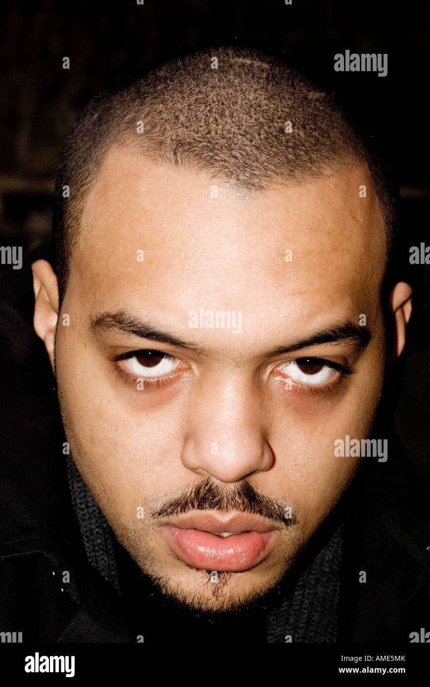 portrait of a young british-caribbean man Stock Photo - Alamy