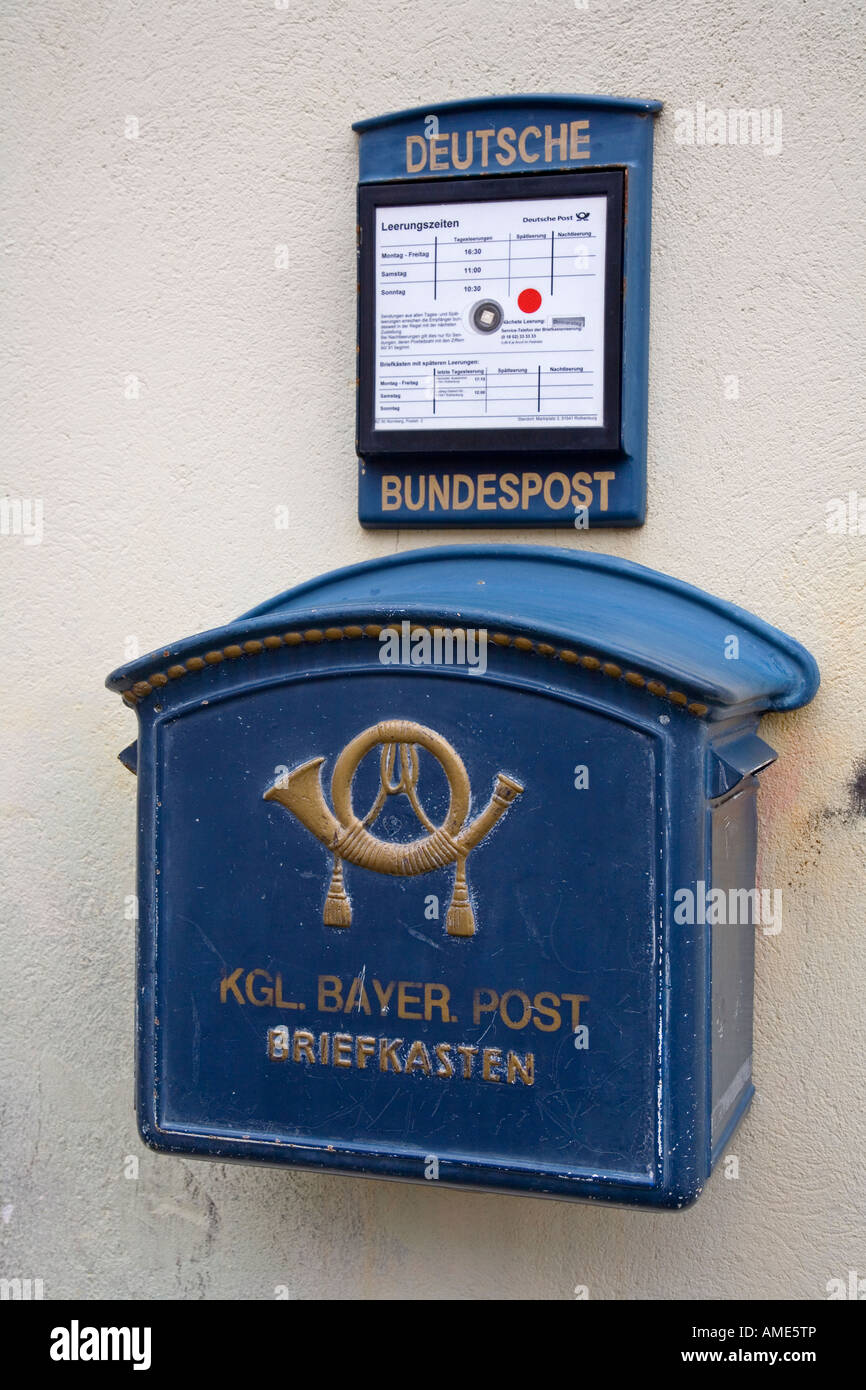 Traditional German postbox with posting times Rothenburg ob der Tauber ...