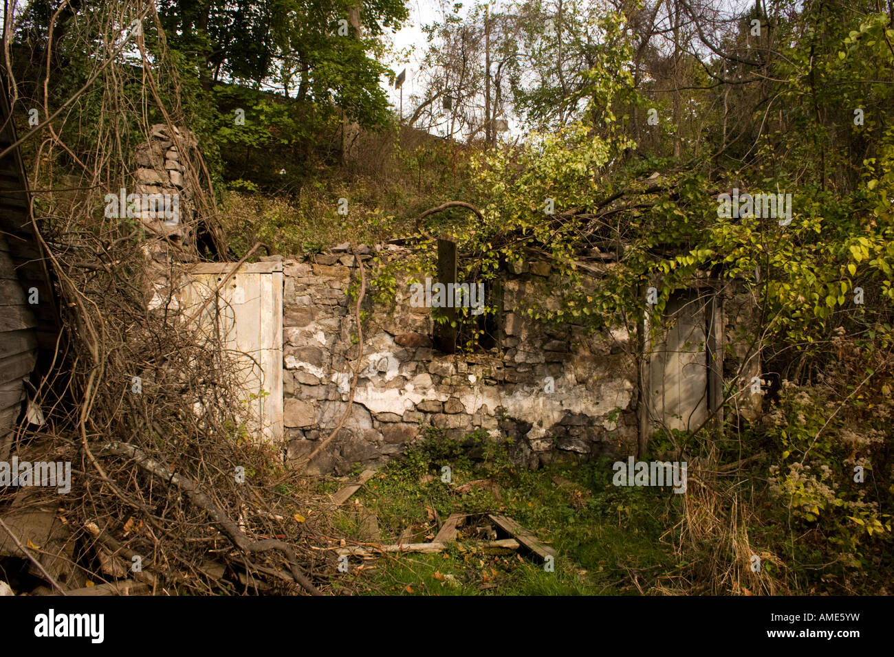 rotten through spring house Stock Photo - Alamy