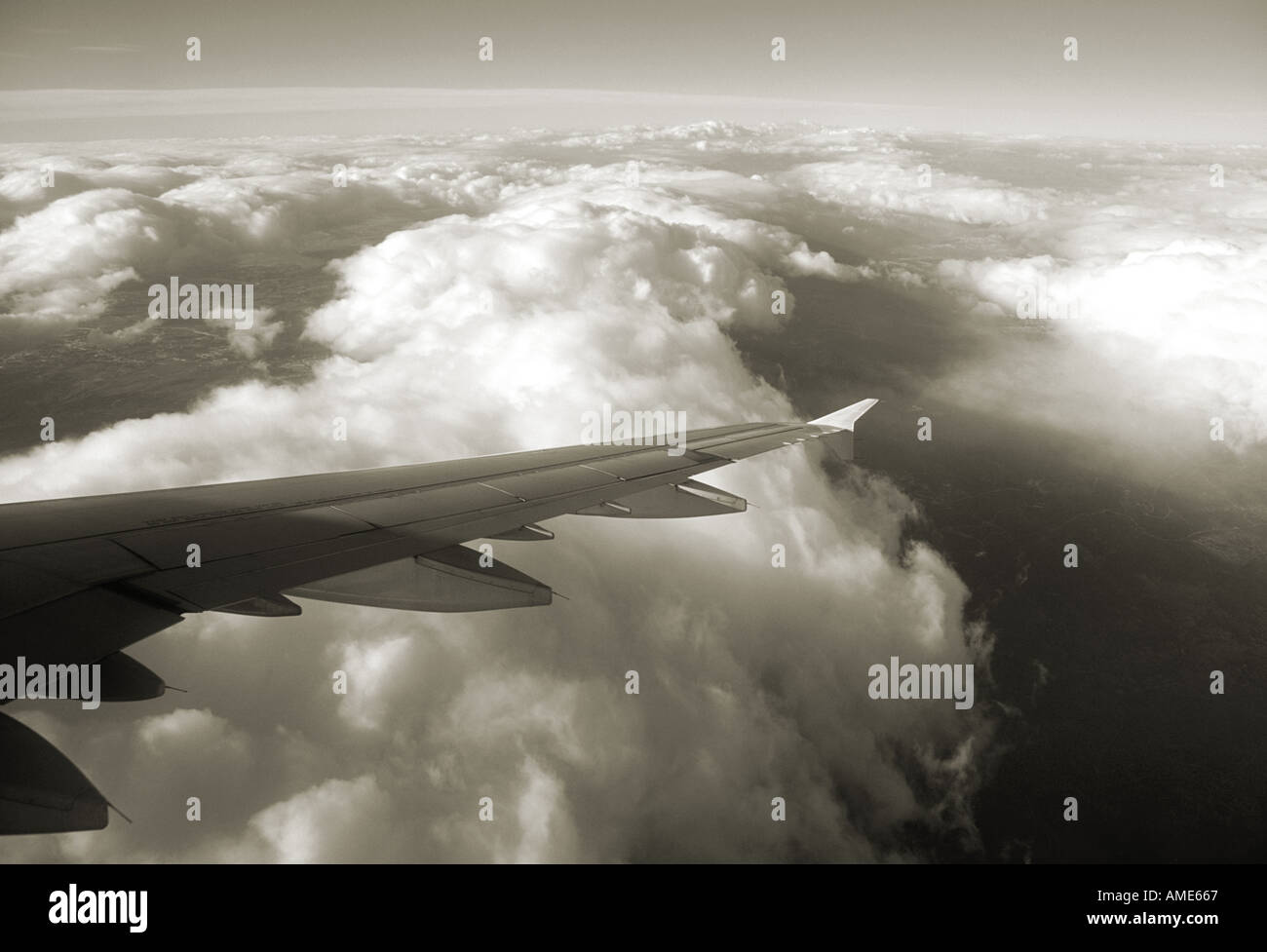 Aircraft wing and clouds Stock Photo - Alamy