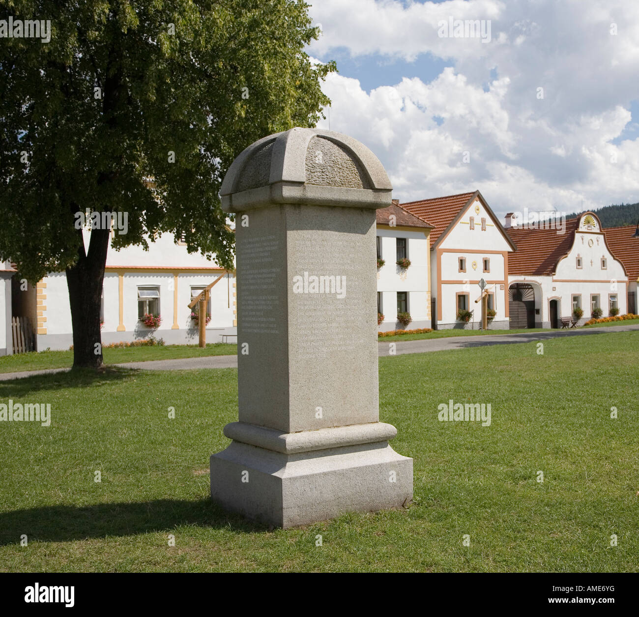 UNESCO commemorative marker with text in different languages Holasovice ...