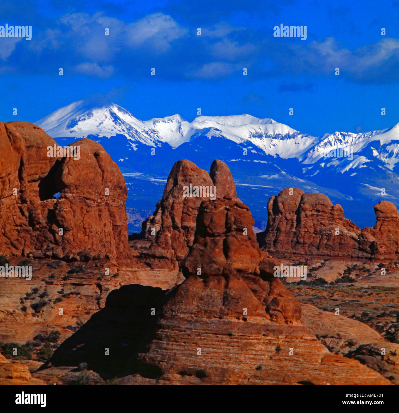 Arches National Park in Utah showing red rock spires with the snow ...