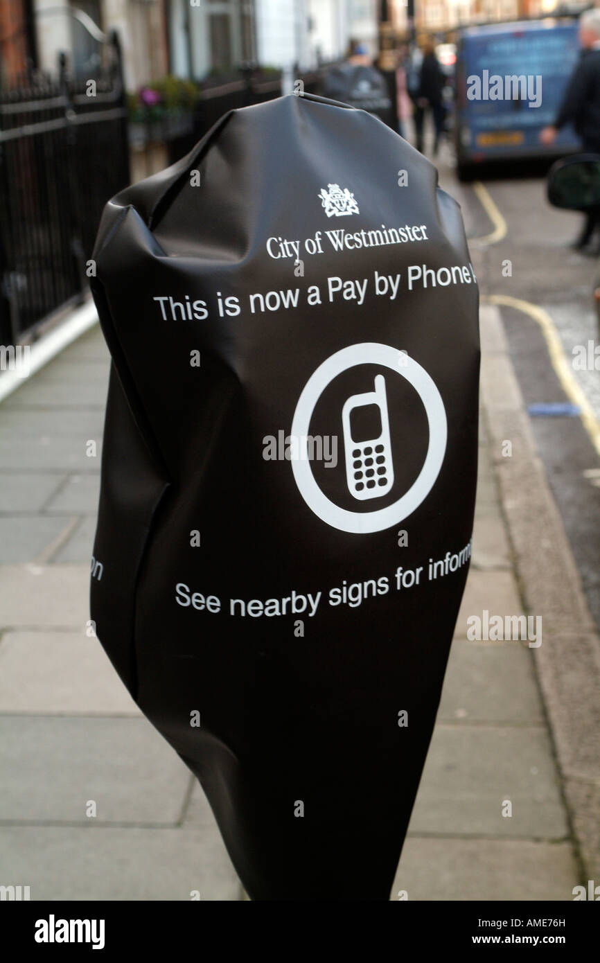 Pay By Phone Parking Meter Cover Sign Central London Stock Photo - Alamy