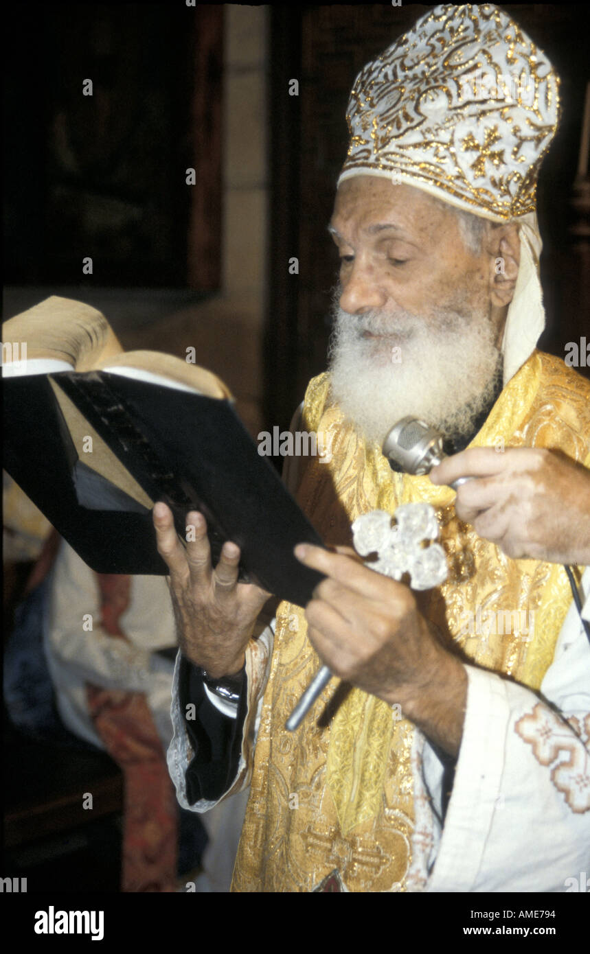 Coptic bishop reading from the bible in Egypt Stock Photo - Alamy