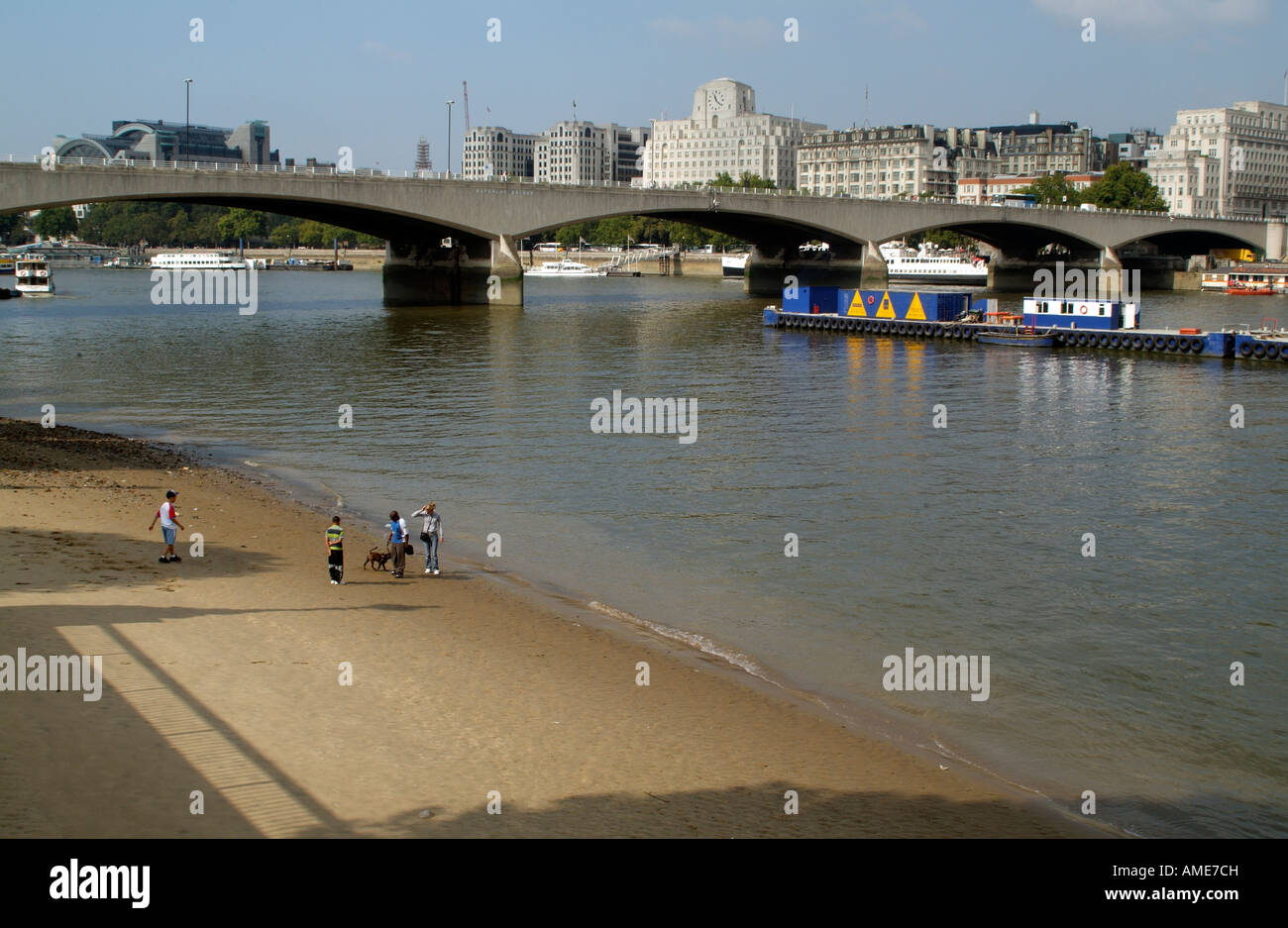 Low Tide on The River Thames at Waterloo Bridge London England Family ...