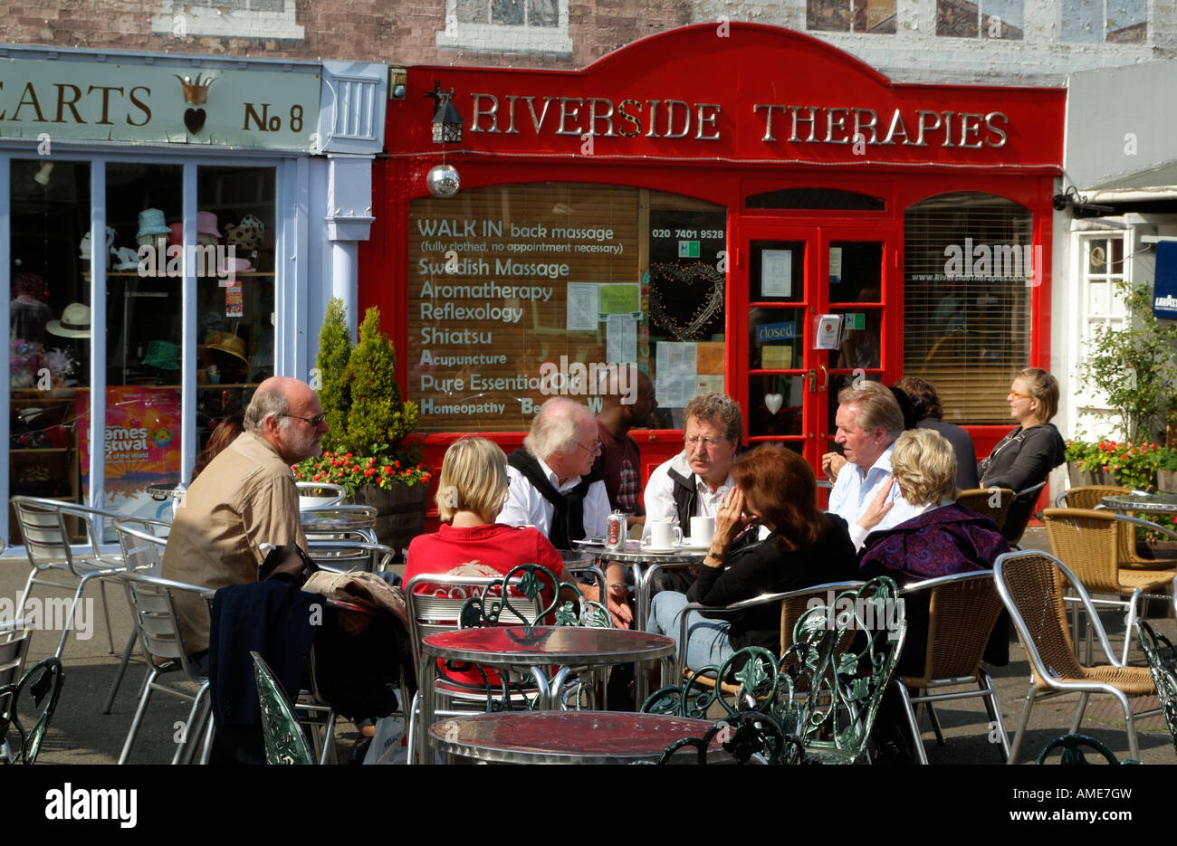 Customers sat at tables hi-res stock photography and images - Alamy