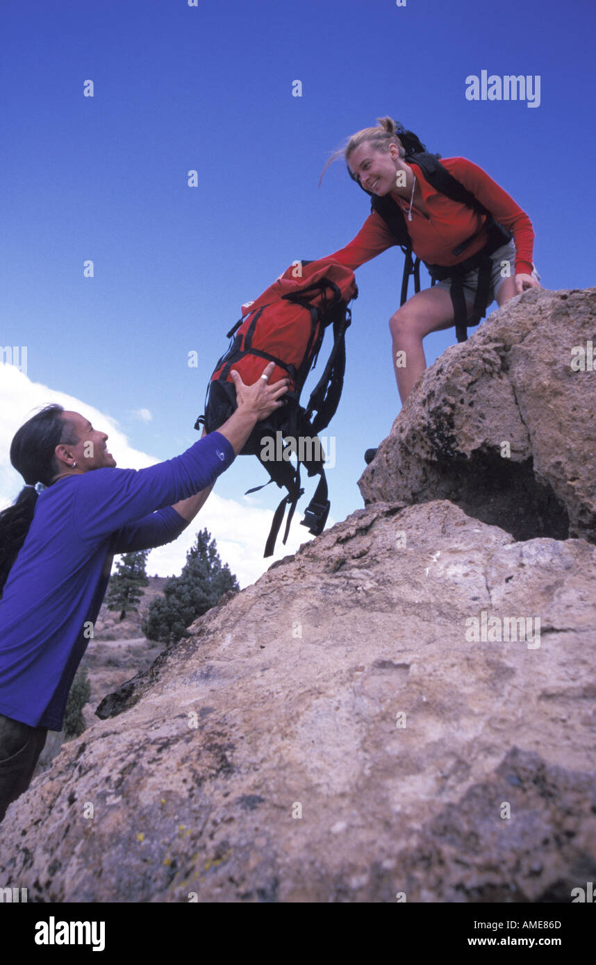 Handing backpack hi-res stock photography and images - Alamy