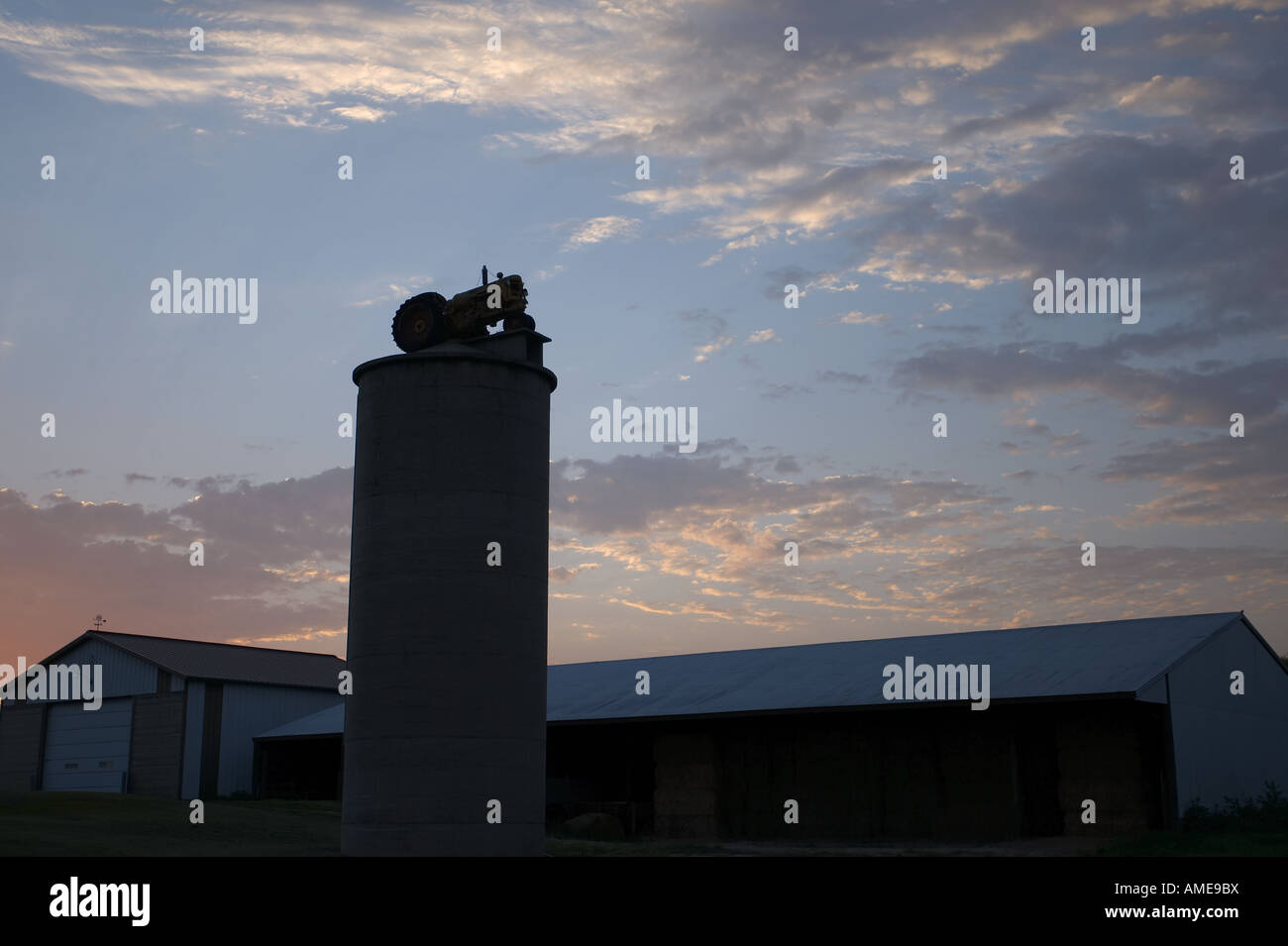 Tractor on a Silo Stock Photo - Alamy