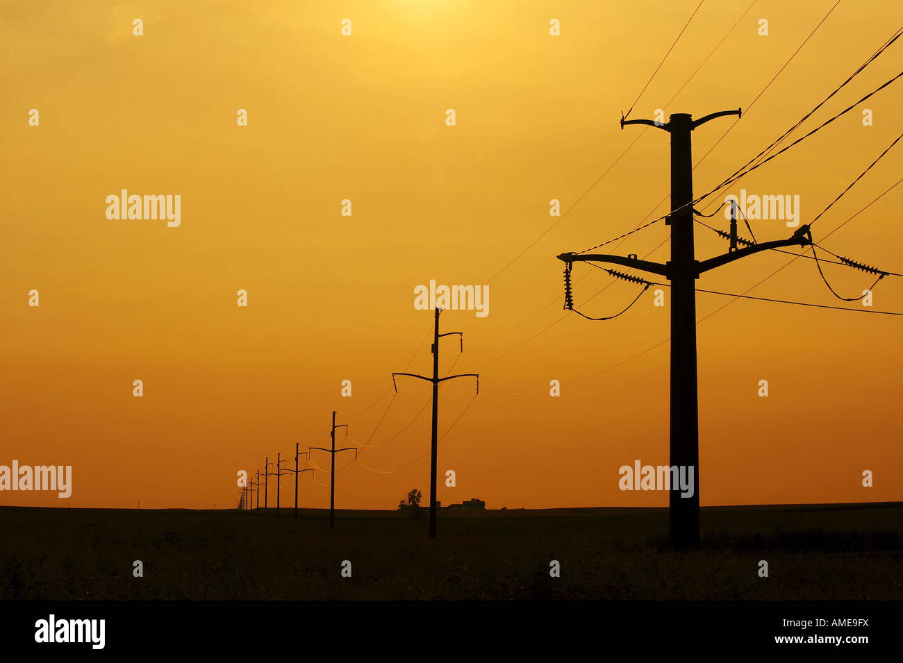 Power lines at Sunset Stock Photo - Alamy