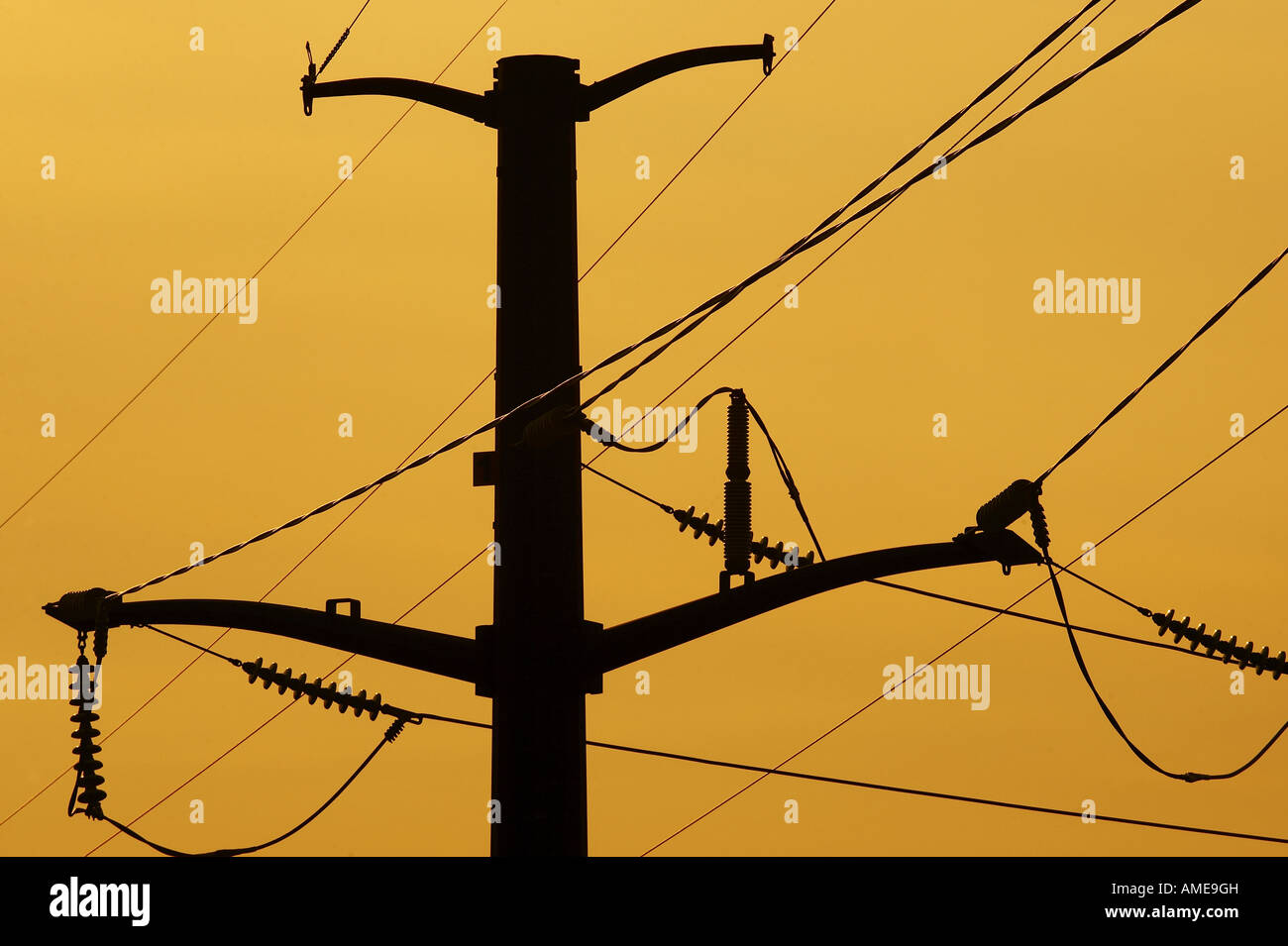 Power lines at Sunset Stock Photo - Alamy