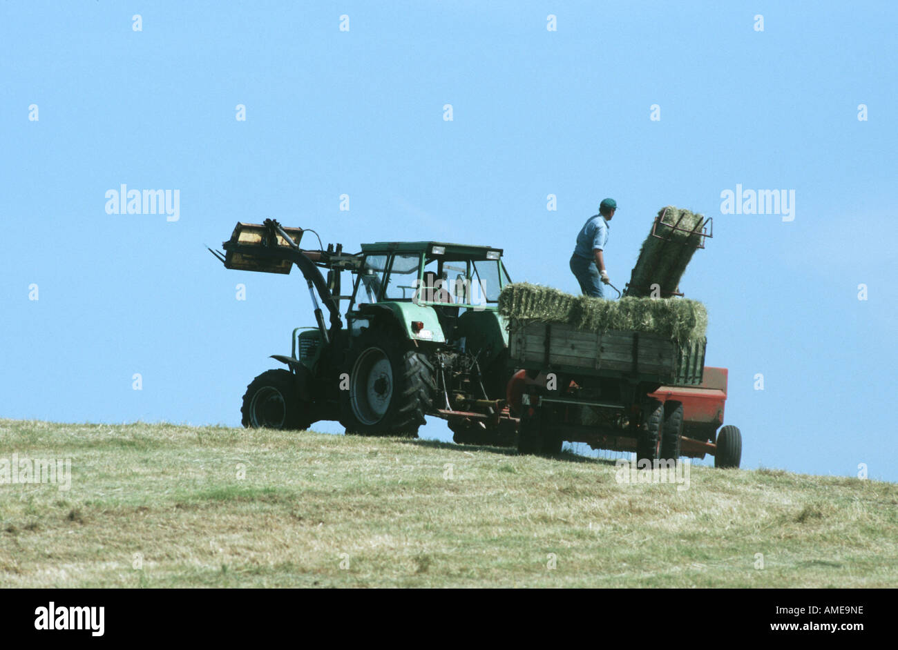 farmer during the haymaking, Germany, North Rhine-Westphalia Stock ...